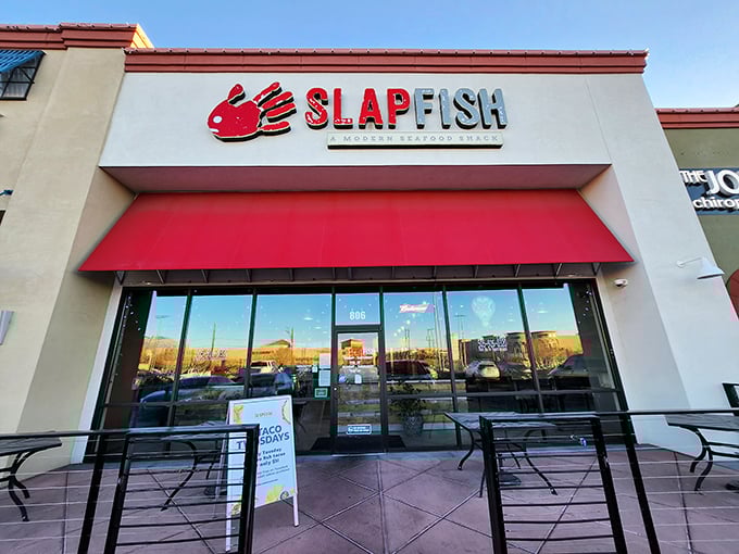 Slapfish's clean, modern facade hides a seafood revolution. That red awning is like a matador's cape to hungry bulls.
