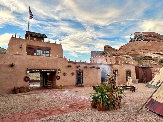The Fort stands like a time machine made of adobe. This isn't just dinner – it's a delicious history lesson with mountain views.