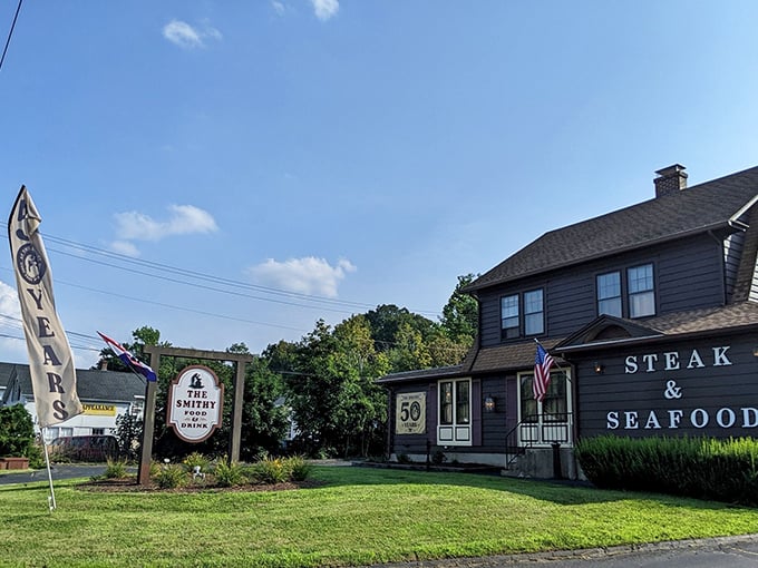 The Smithy stands proud with its "50 years" sign – that's half a century of perfecting the art of steak!