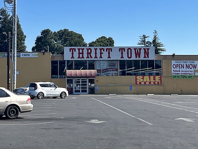Thrift Town's bold red letters announce a shopping adventure where one person's donation becomes your discovery.