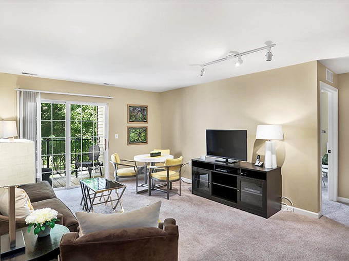 Bright, airy living spaces that say "welcome home" without saying "goodbye savings." That sliding door is calling your name!