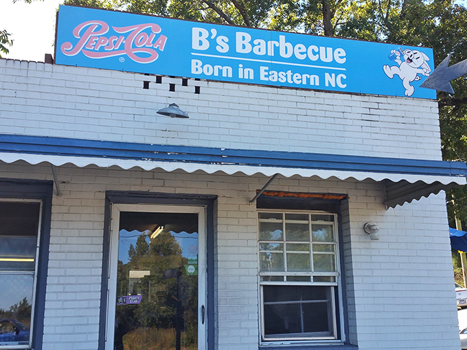That faded Pepsi sign at B's Barbecue might as well say "Get here early" – they sell out almost every day!