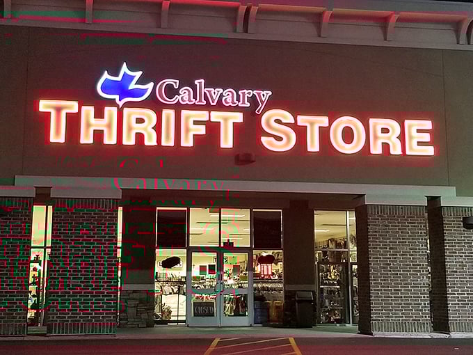 Night or day, that neon glow means savings ahead. Calvary Thrift Store lights up the evening for after-work treasure hunters.