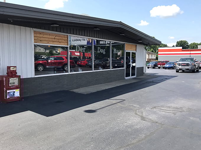 Der Dog Haus keeps things straightforward and classic—no frills, just good food waiting behind those glass windows.