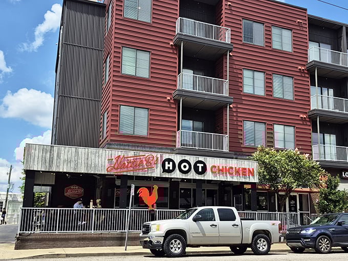 The outdoor patio at Hattie B's – where brave souls recover between bites of chicken that doesn't just talk the talk.