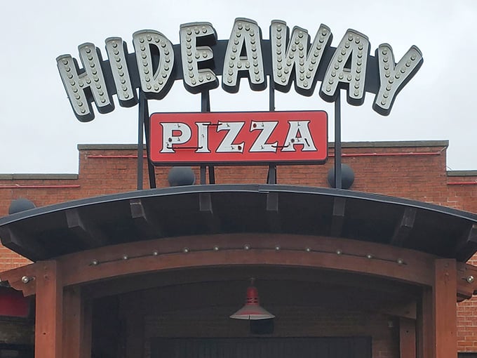 That illuminated sign isn't just advertising—it's a local landmark promising pizza perfection. Hideaway has been lighting up Tulsa's taste buds for decades.