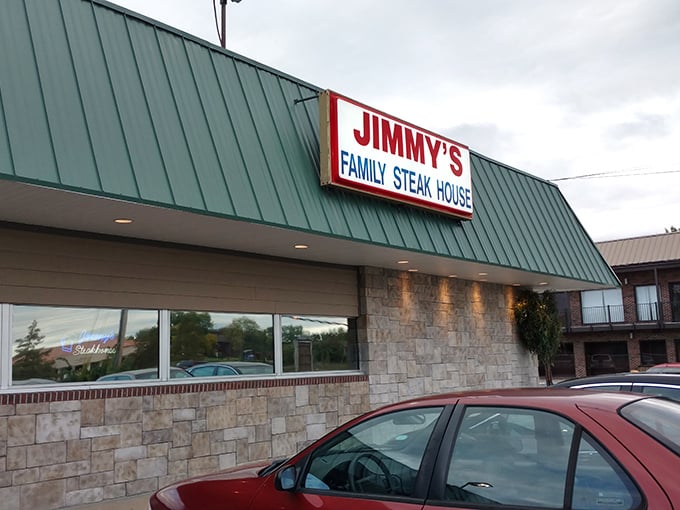 Classic green roof, straightforward sign—Jimmy's doesn't need fancy frills when the steaks speak volumes. Simplicity at its most delicious.