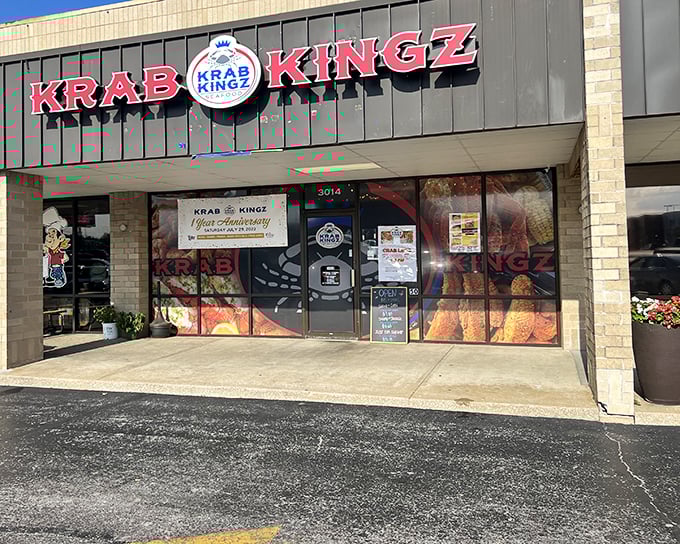 The colorful window displays at Krab Kingz are like seafood billboards – resistance is futile when those crab legs are calling.