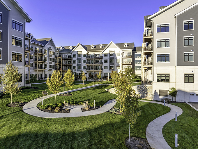 Contemporary design meets Kansas practicality in this welcoming Prairie Village community that feels like home.