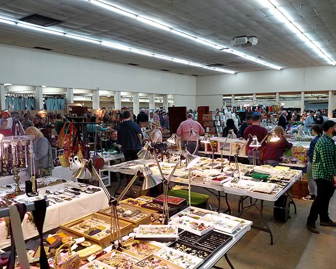 Tables laden with jewelry treasures at Nashville Flea Market – like a pirate's chest exploded in the most organized way possible.
