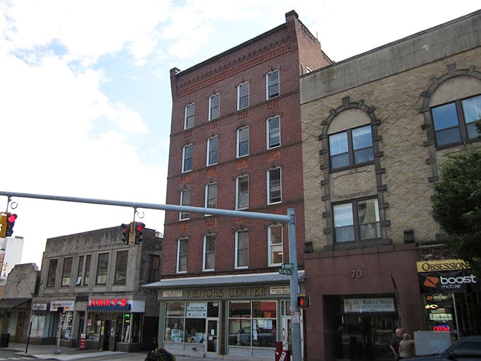 These brick beauties have stood through decades, watching prices stay reasonable while neighboring towns went sky-high.