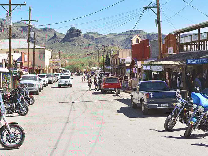 The desert mountains provide a dramatic backdrop to Oatman's dusty main street. You half-expect John Wayne to stroll around the corner.