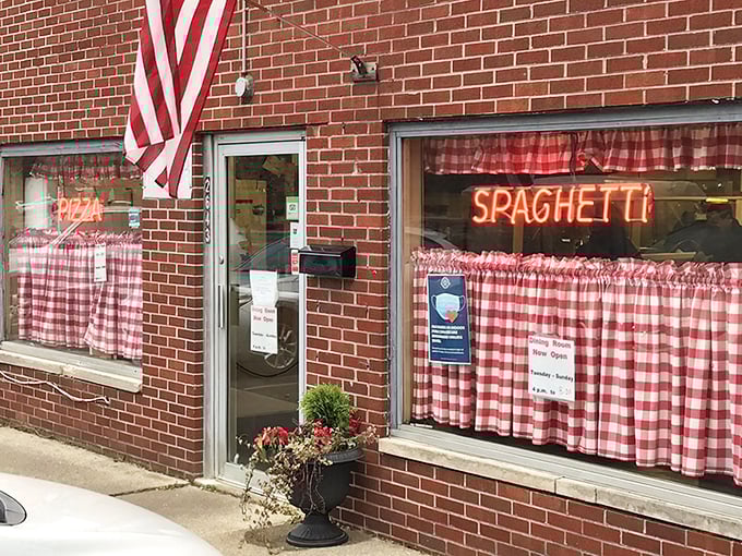 That classic brick exterior has welcomed hungry families for generations of pizza perfection.