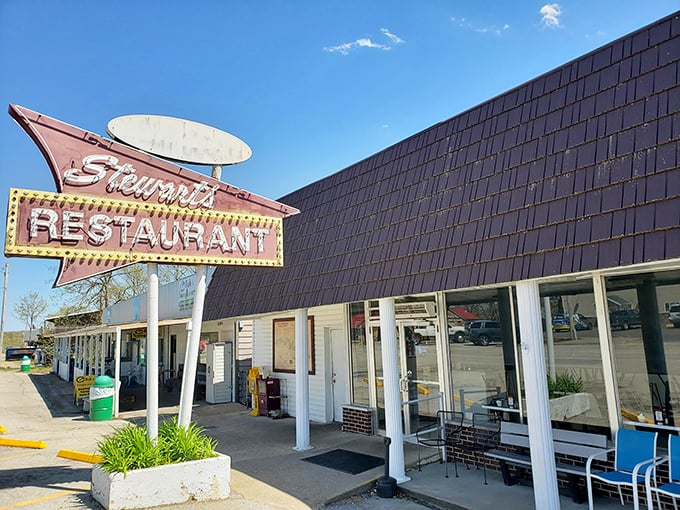 The distinctive A-frame roof and vintage signage promise the kind of no-nonsense breakfast that'll fuel a full day of lake adventures.