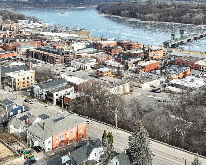 From above, Stillwater reveals its clever urban planning—a perfect marriage between historic charm and river views that would make any drone photographer weep with joy.