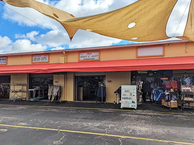 Shade sails and coral-colored storefronts create the perfect backdrop for browsing, where every open doorway promises new possibilities.