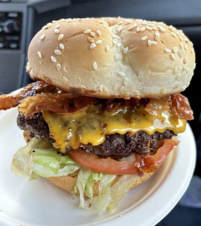 The Bunny Burger in all its glory—melted cheese cascading over a perfectly seared patty, nestled in a poppy seed bun. Poetry on a plate.