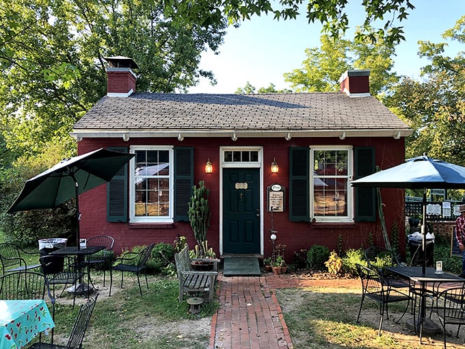 This charming red cottage could be straight from a fairy tale. Half-expected Goldilocks to emerge offering freshly baked cookies.