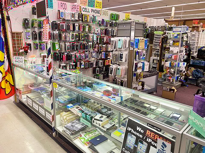 The modern bazaar experience: enough phone cases to outfit every smartphone in Baltimore County, arranged with the precision of a tech museum.