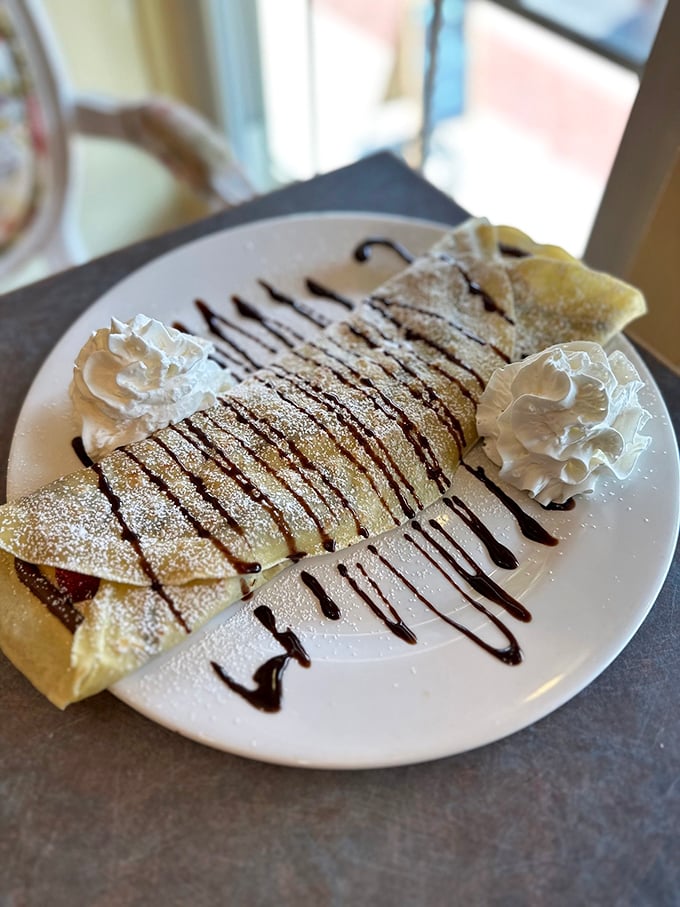 Not all heroes wear capes—some come drizzled in chocolate, dusted with powdered sugar, and flanked by perfect dollops of whipped cream.