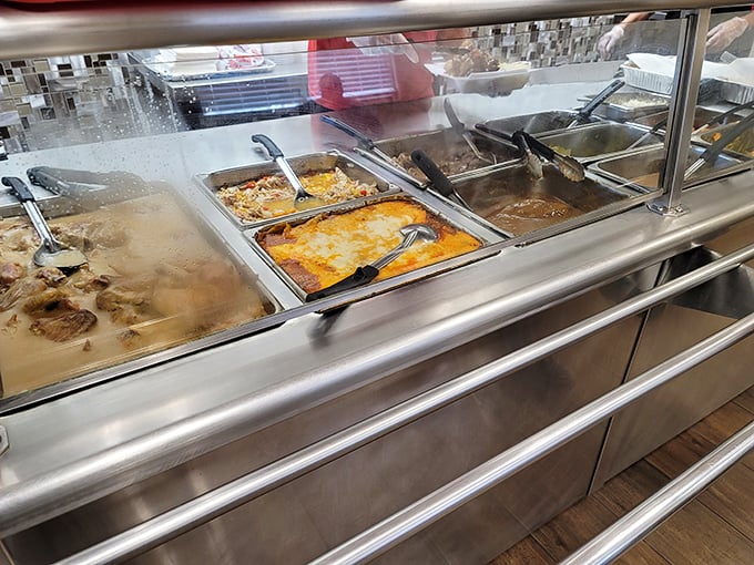 The steam rising from these trays isn't just vapor—it's aromatic poetry. Each compartment holds a different chapter in the Southern comfort food story.