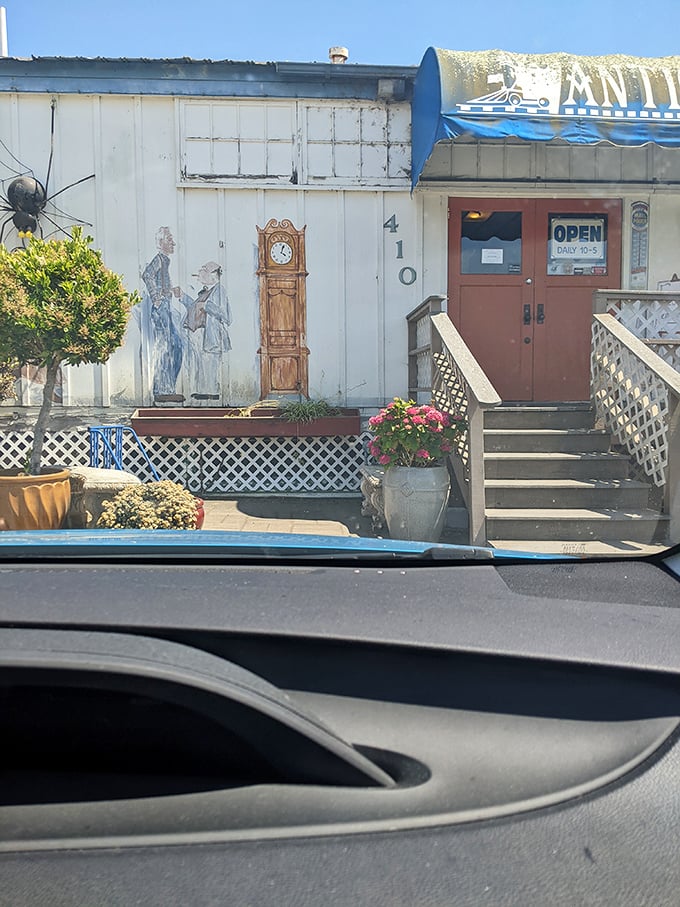 That orange door isn't just an entrance—it's a portal to the past. The painted grandfather clock on the wall is perpetually set to "adventure time."