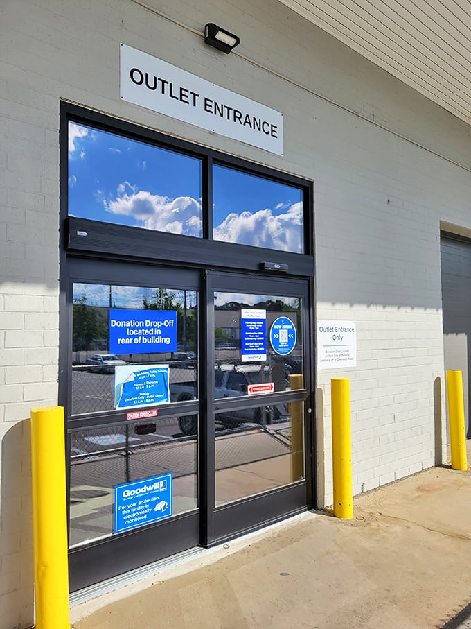 The gateway to thrifting nirvana. That "Outlet Entrance" sign might as well read "Abandon all budget restraints, ye who enter here."