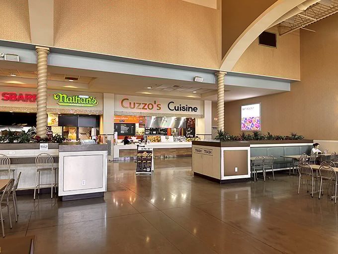The food court oasis—where hungry shoppers refuel with Nathan's, Cuzzo's Cuisine, and other quick bites before diving back into the bargain fray.