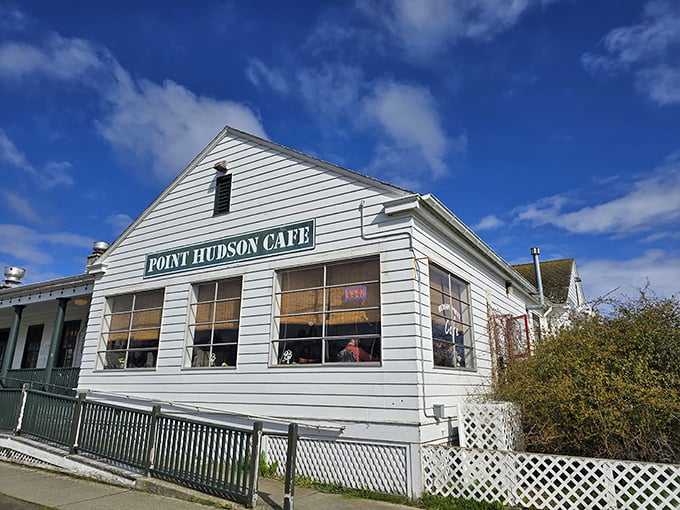 The Point Hudson Cafe offers that quintessential coastal dining experience—simple white clapboard exterior, panoramic water views, and the promise of comfort food with a side of maritime history.
