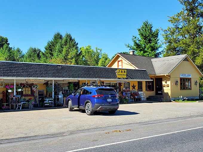 J&R Country Store stands as a cheerful yellow beacon of retail therapy, country-style—no app required, just good old-fashioned browsing.
