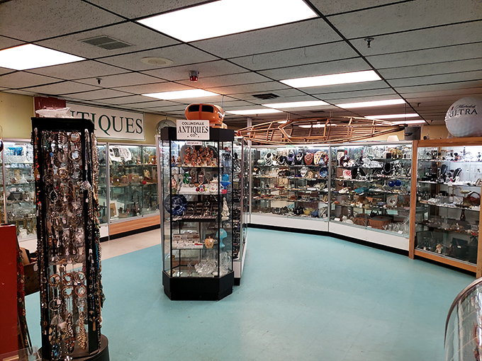 The jewelry section gleams with possibilities – each display case a time capsule of fashion statements from generations who knew how to accessorize.