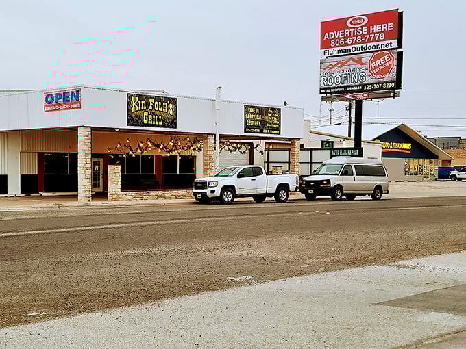 Rib Folks Grill beckons hungry travelers with the universal language of Texas – slow-cooked meat that doesn't need fancy explanations, just plenty of napkins.