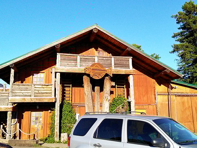This rustic wooden structure with its fish emblem might look like a movie set, but it's pure Oregon—where history isn't displayed behind glass but lived in daily.