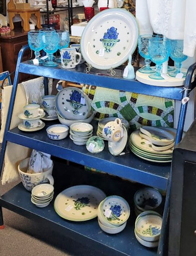 That blue glassware collection isn't just kitchenware—it's a portal to Sunday dinners at grandma's when dessert came with stories.