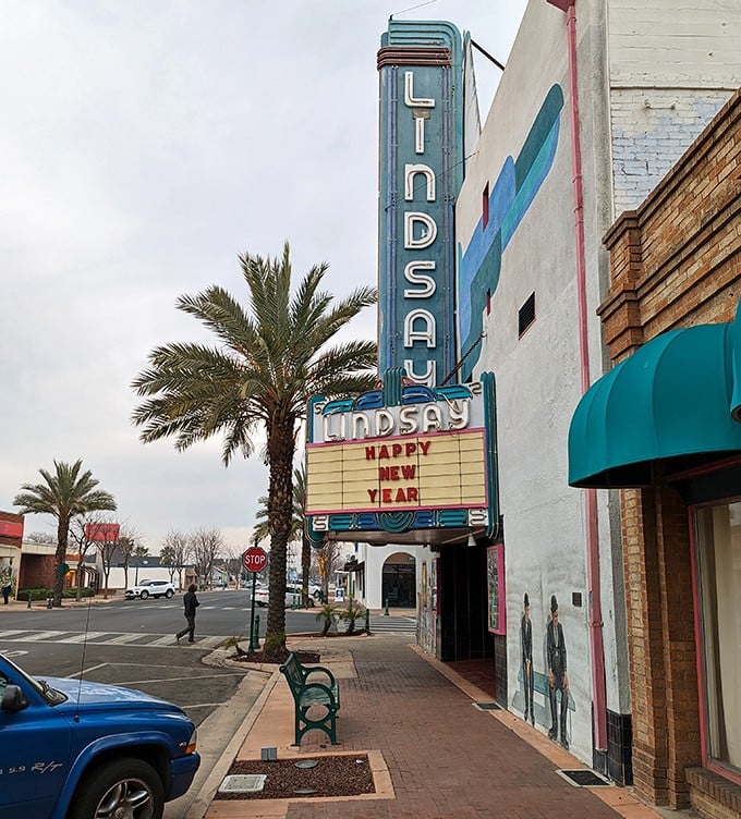 The Lindsay Community Theatre's vintage marquee promises entertainment the old-fashioned way—no streaming subscriptions required, just community and shared laughter under one roof.