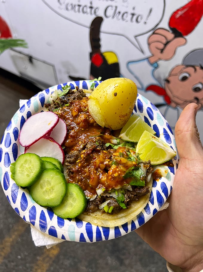 This isn't just a taco—it's edible art. The lengua taco comes adorned with nature's perfect garnishes: radish, cucumber, and lime.