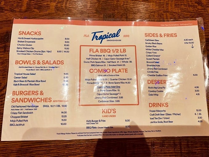 The menu reads like a love letter to Florida's culinary crossroads, where Southern BBQ traditions meet Caribbean influences.