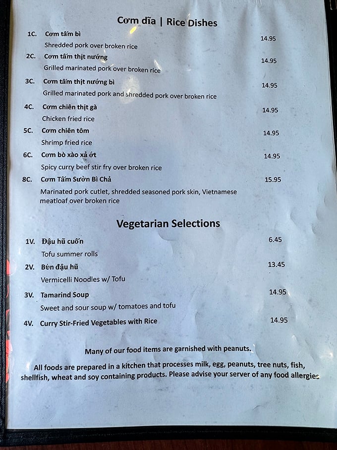 The menu reads like a love letter to Vietnamese cuisine, with each dish promising more flavor than the modest descriptions let on.