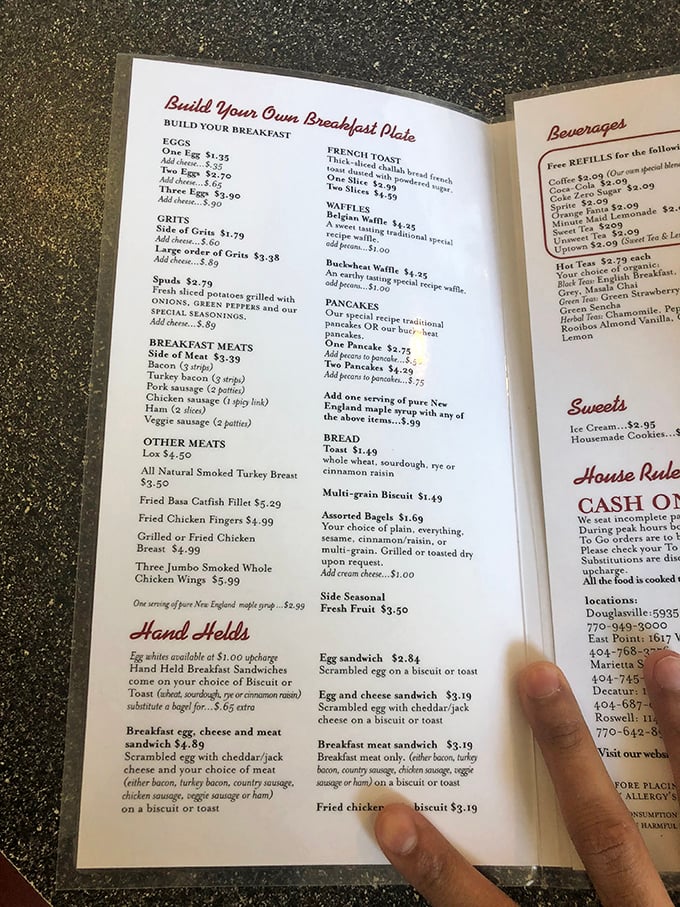 The menu – a sacred text of breakfast possibilities where "Build Your Own Breakfast" isn't just an option, it's practically a constitutional right.