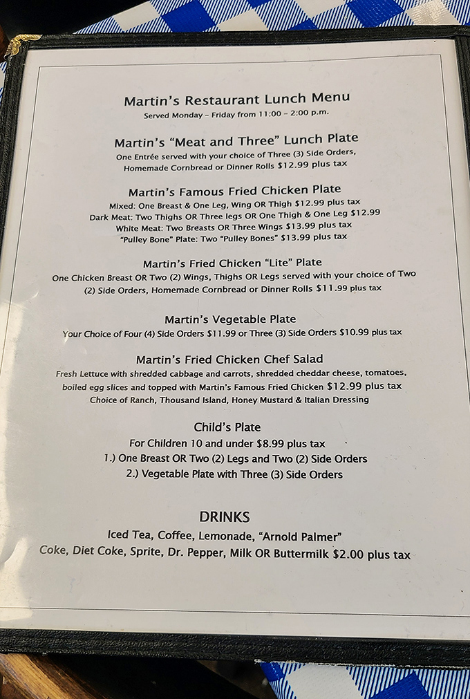 Martin's straightforward menu doesn't mince words – it's all about that famous fried chicken and the beloved "meat and three" tradition.