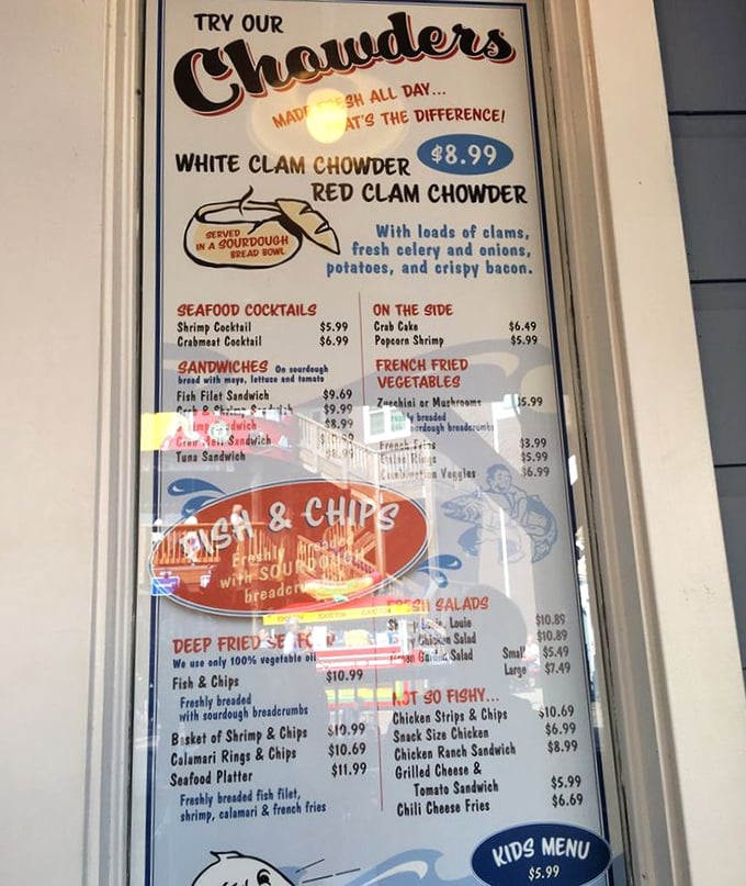 The menu board reads like poetry to hungry visitors – white clam chowder, red clam chowder, and that legendary fish and chips.