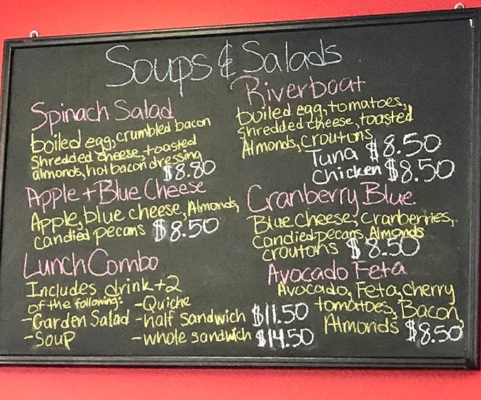 The chalkboard menu reads like poetry for the hungry—each salad a promise that you've earned dessert.
