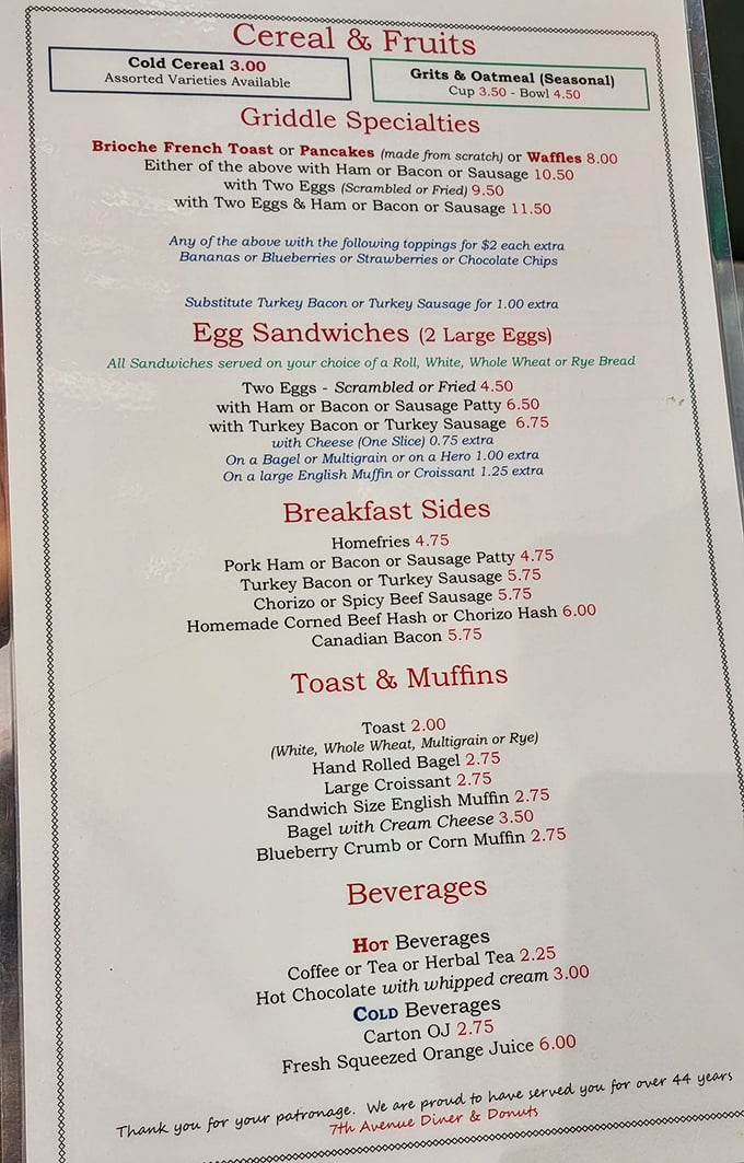 A menu that doesn't need fancy fonts or pretentious descriptions—just honest food at honest prices. The breakfast section alone is poetry to a hungry soul.