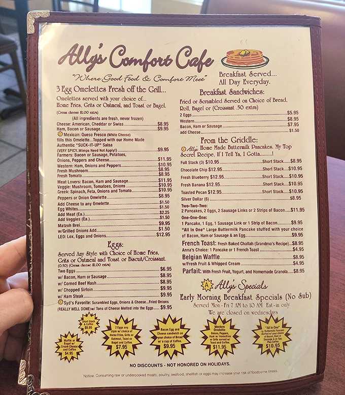 This menu isn't just a list of food—it's a roadmap to happiness. Note the "secret recipe" pancakes with their playful threat.