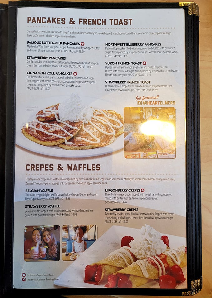 The menu reads like a love letter to breakfast classics, with signature items marked by hearts—because some pancakes deserve special affection.