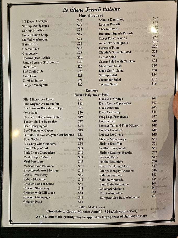 The menu reads like a love letter to French cuisine—from escargot to soufflé, each dish promises a vacation for your taste buds.