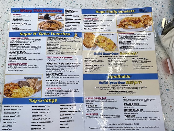 The menu reads like a love letter to morning indulgence. "Huge Fluffy Omelets" isn't marketing hyperbole—it's a solemn breakfast oath.