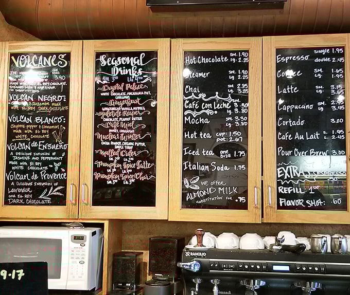 The chalkboard menu reveals Angel Falls' volcanic coffee origins – a geography lesson you can actually drink!
