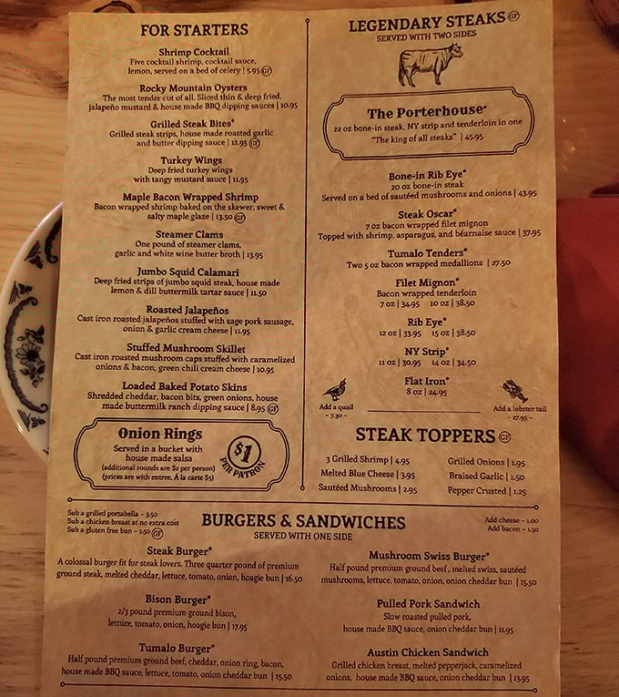 A menu that reads like a carnivore's dream journal. The "Legendary Steaks" section isn't just marketing—it's a promise they deliver on with sizzling perfection.