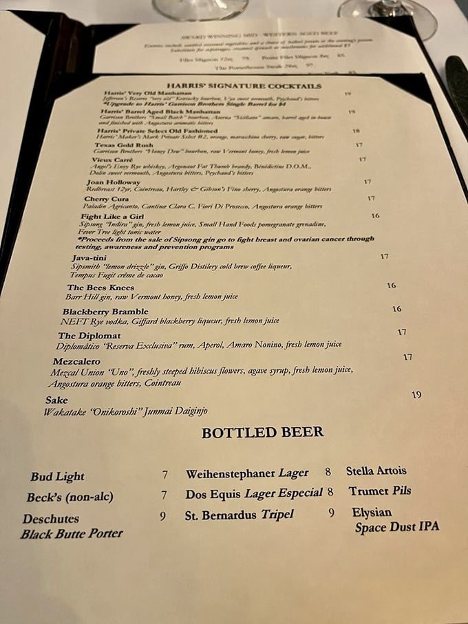 The cocktail menu reads like a love letter to libation craftsmanship. That "Fight Like a Girl" cocktail supports breast cancer research – drinking for a cause!